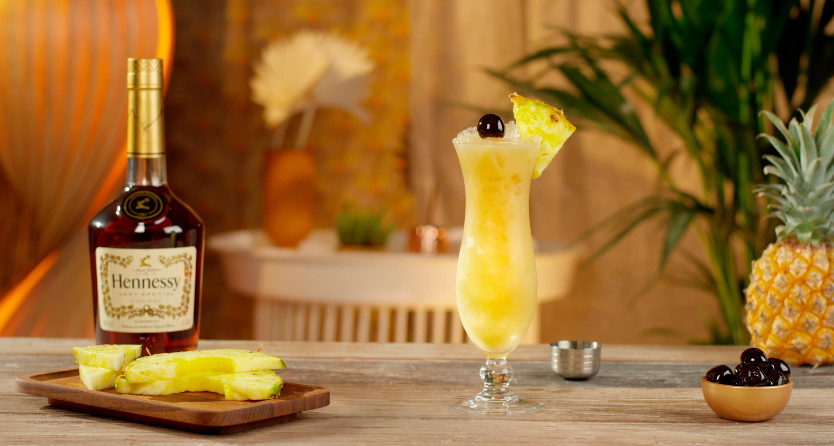 Cognac cocktail with spiced rum Piña Colada - Hennessy